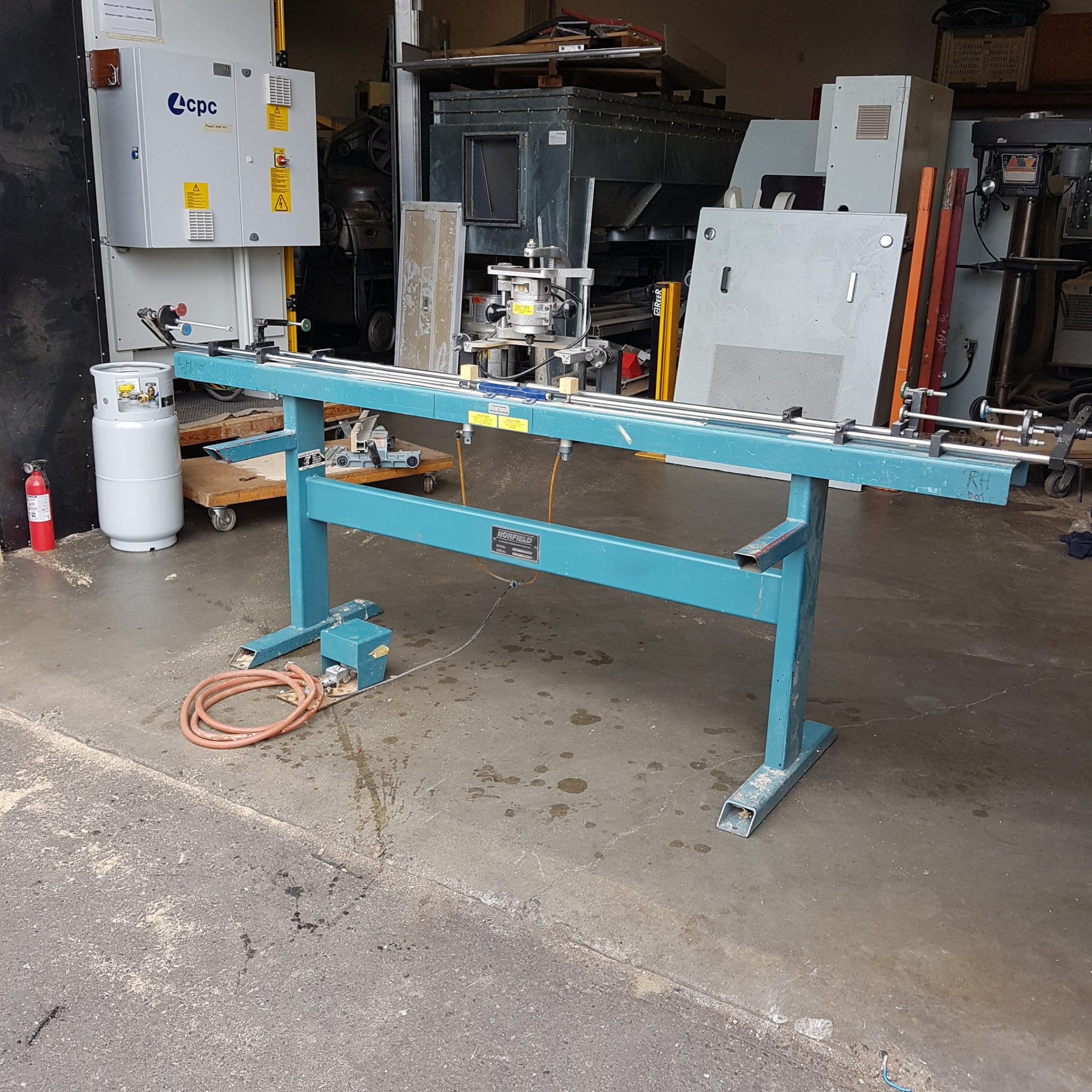 Used Norfield 250 M Strikerplate Machine – Coast Machinery Group