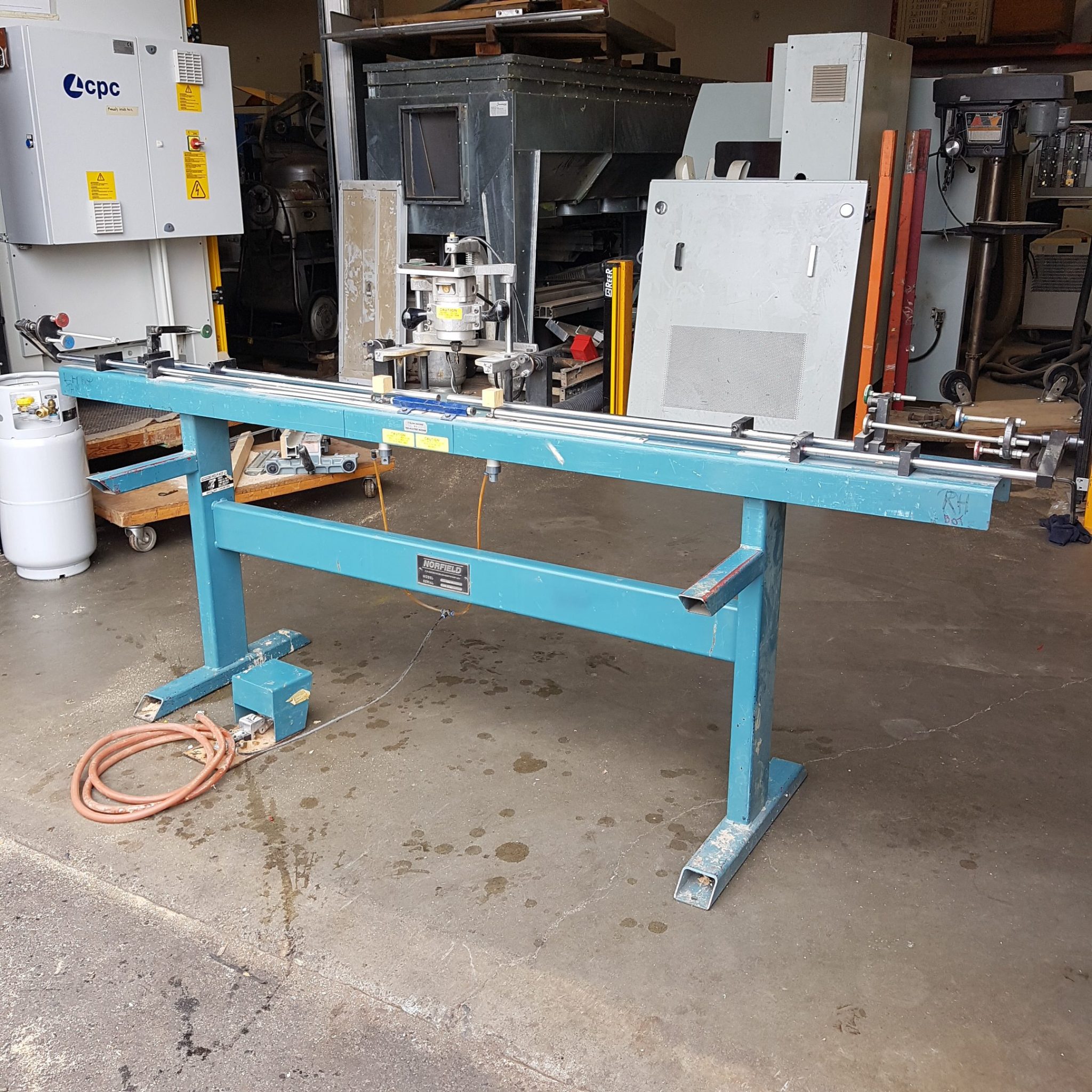 Used Norfield 250 M Strikerplate Machine – Coast Machinery Group